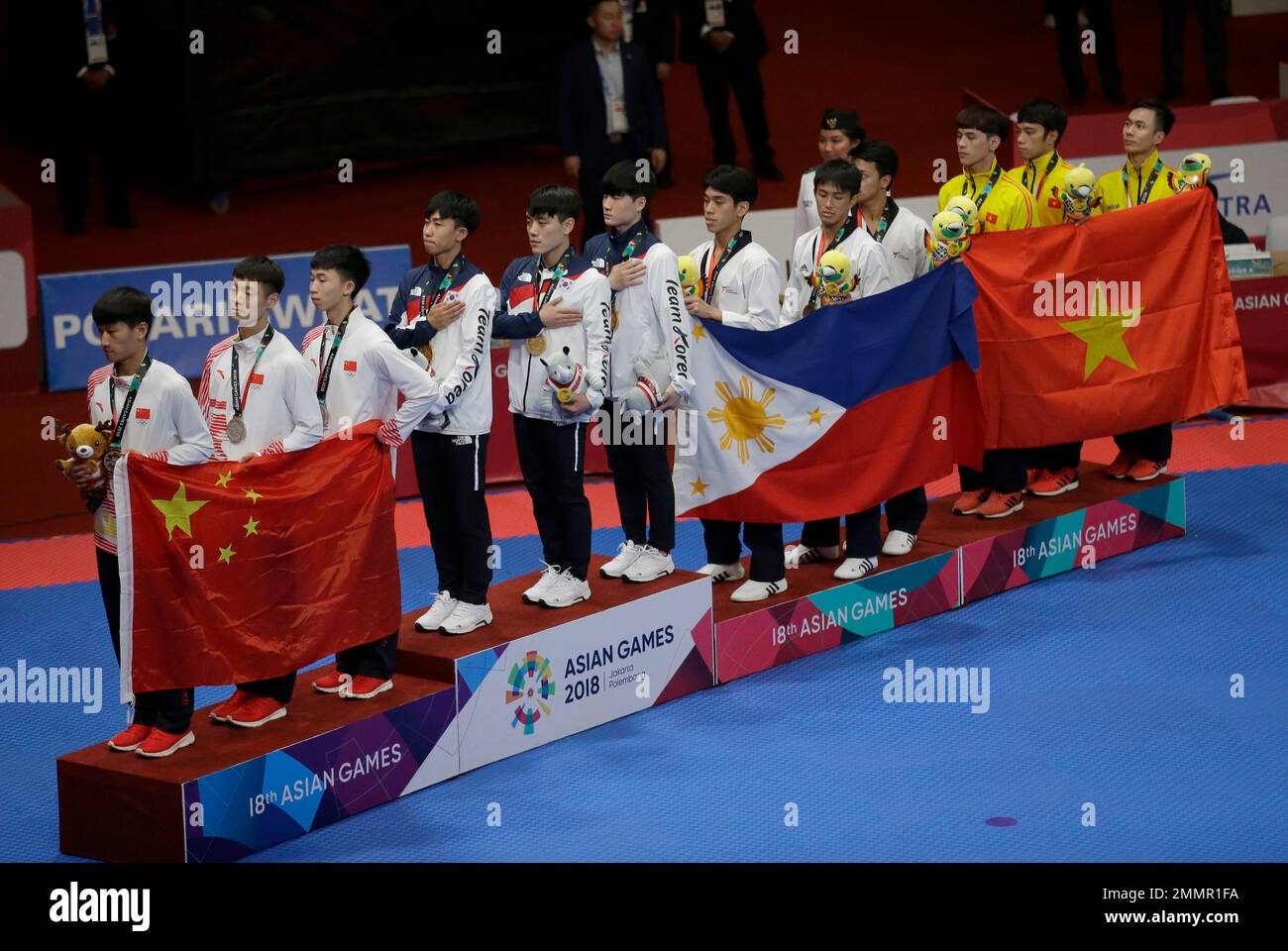 From left, silver medalist China, gold medalist South Korea, bronze ...