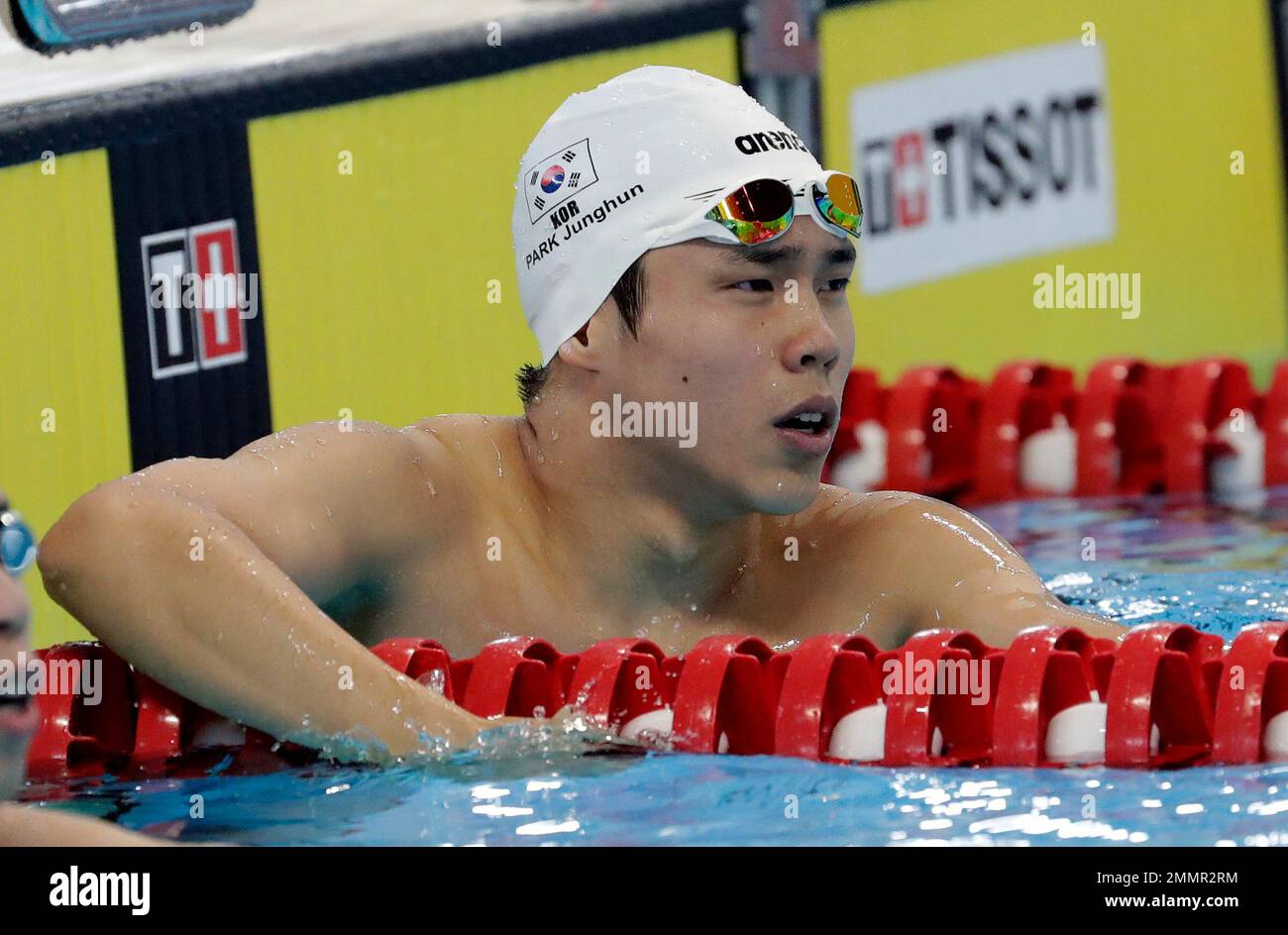 South Korea's Park Junghun reacts after his heat in the men's 200m butterfly during swimming ...
