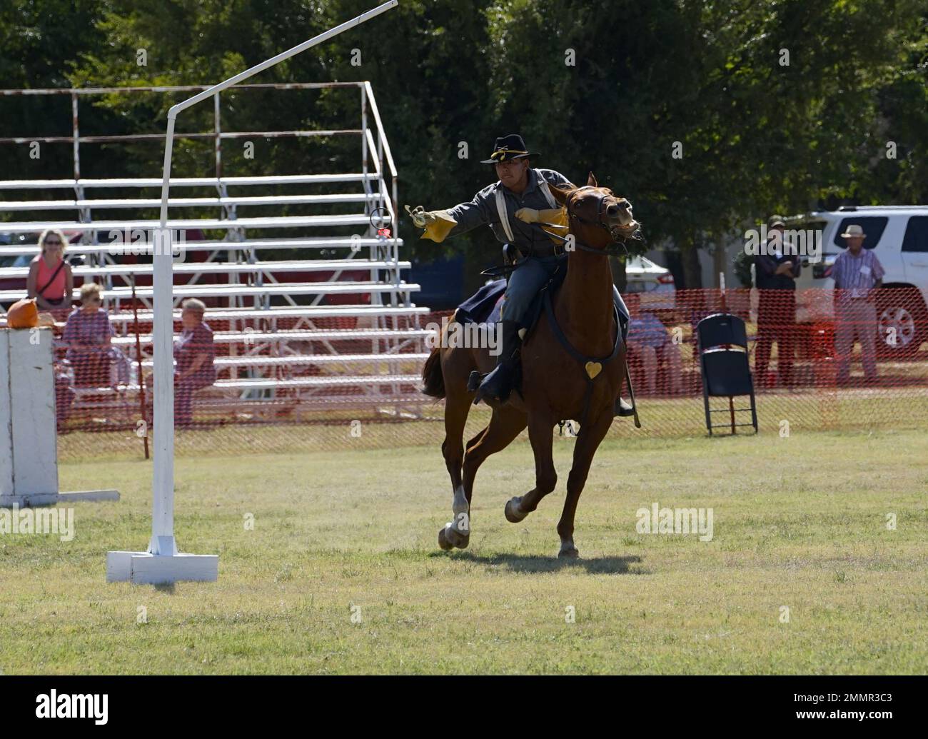 Cpl. Nicole Wagoner, a Fort Carson Mountain Color Guard (FCMCG) Soldier, and her horse, Master ...