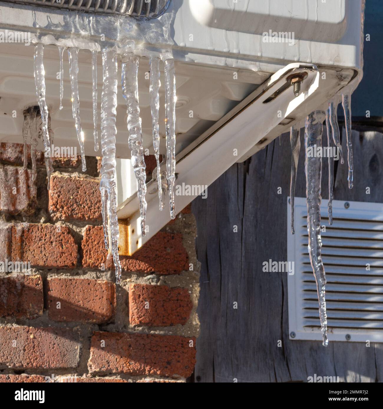 Very beautiful transparent icicles hanging structures of the house ...
