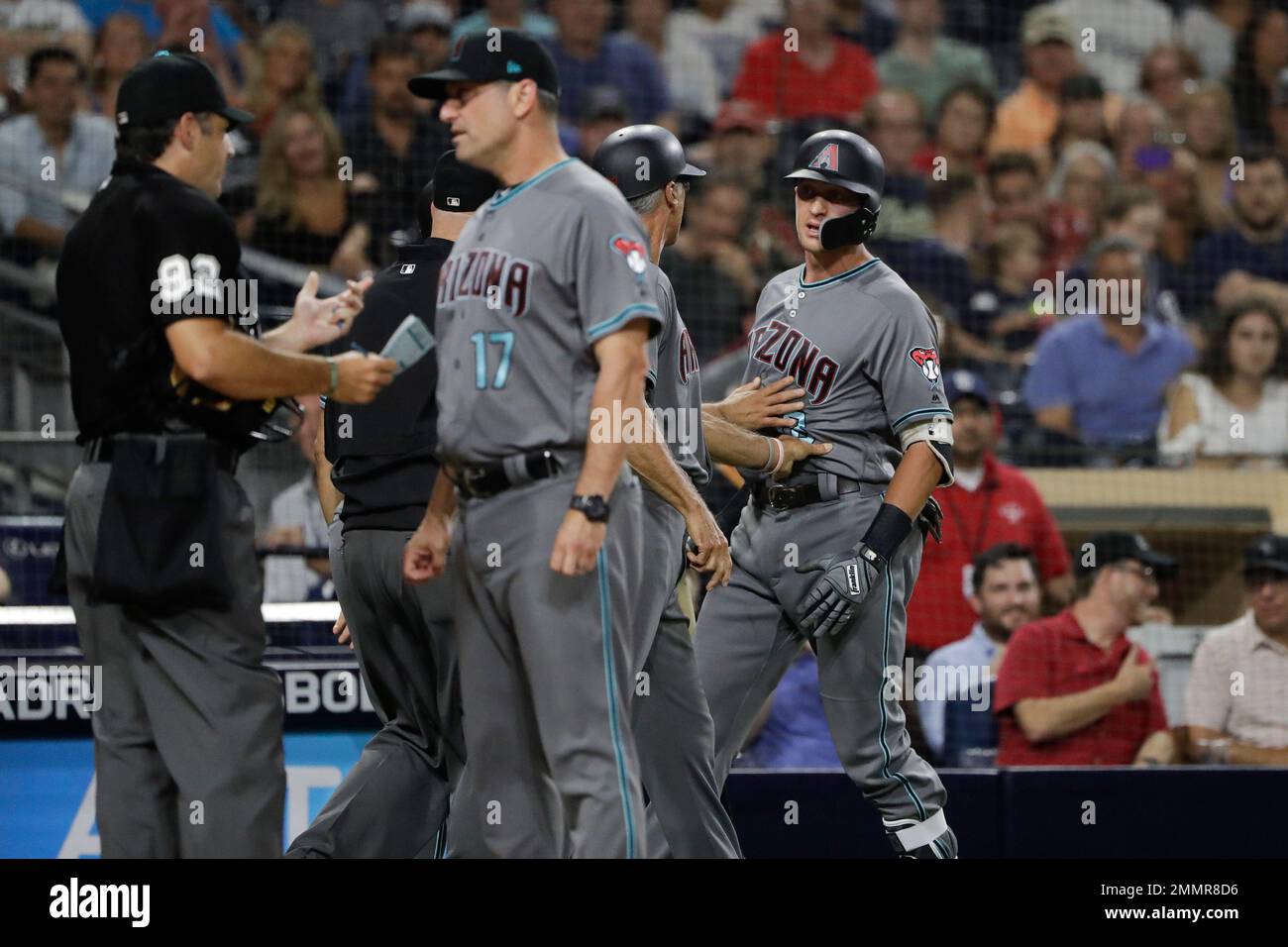 Arizona Diamondbacks' Nick Ahmed (13), right, reacts after arguing with ...