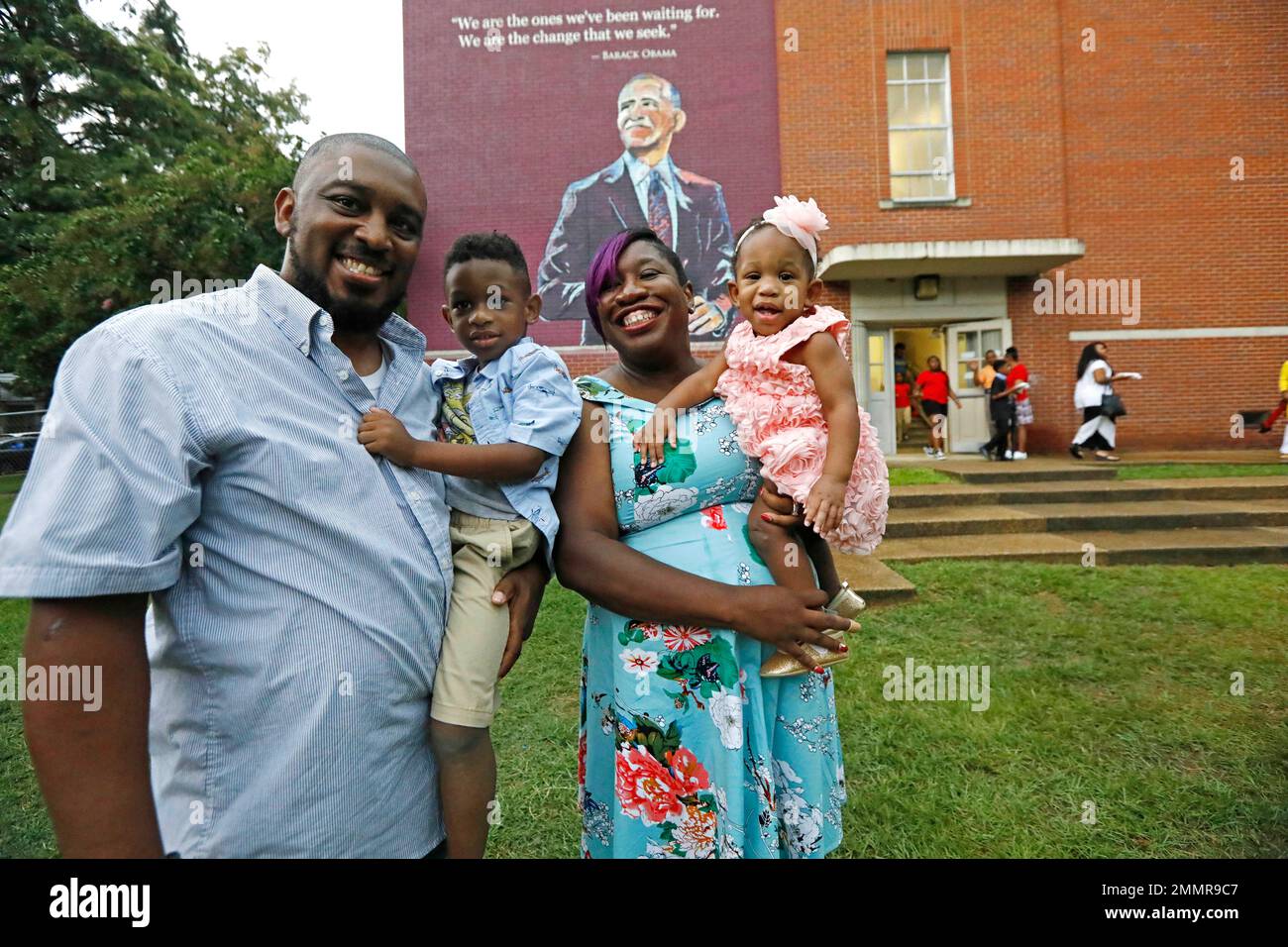 Charles and Talamieka Brice, stand with their two children, son Honor ...