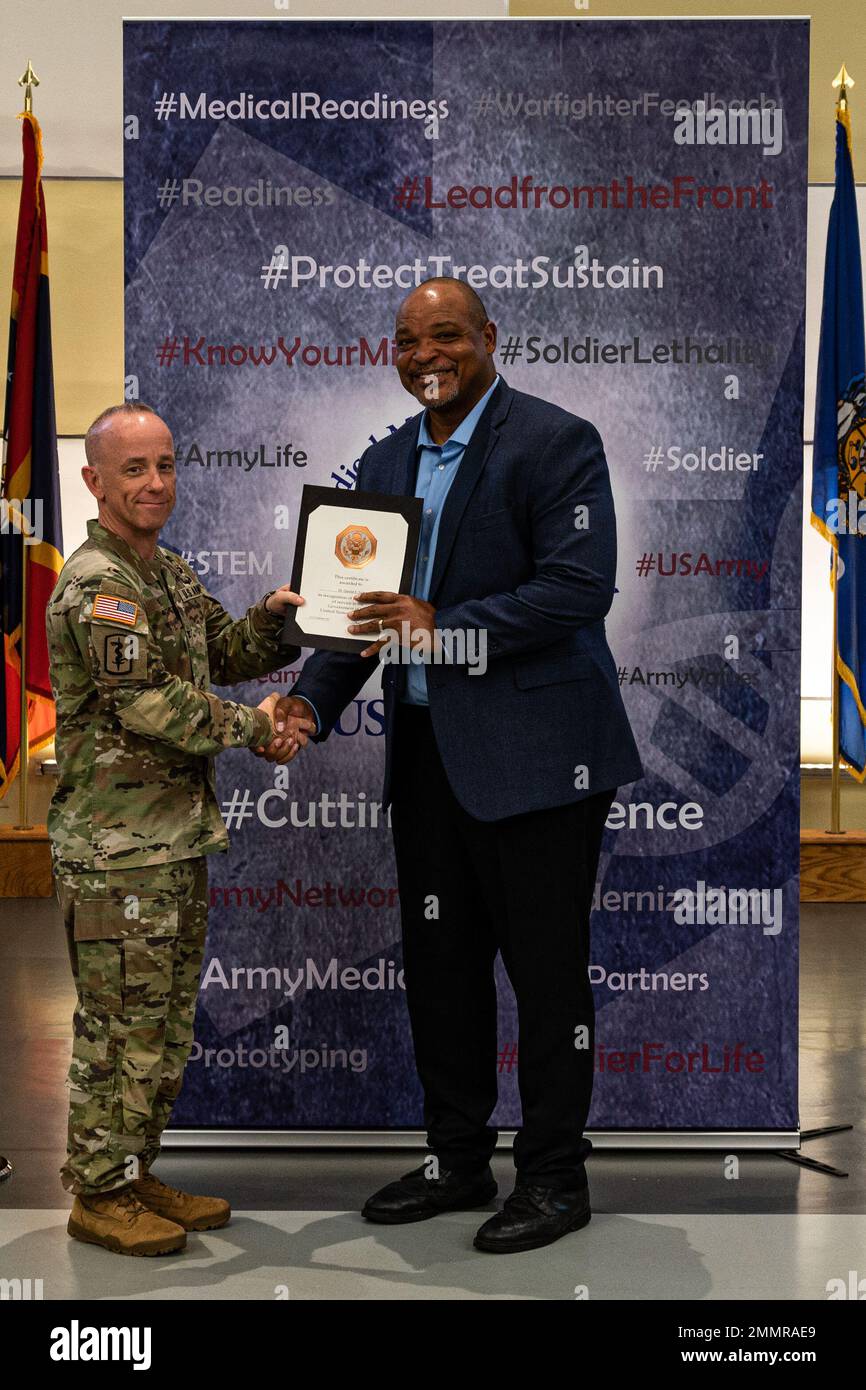 Col. Andy Nuce presents Dr. Quentin Scott a 15 year Service Award ...