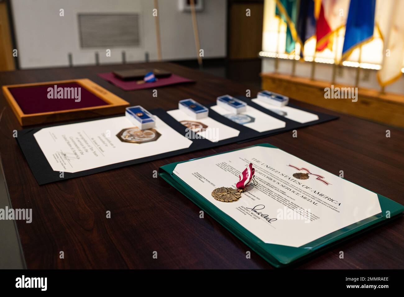 Awards and certificates sit on display before the start of a U.S. Army ...