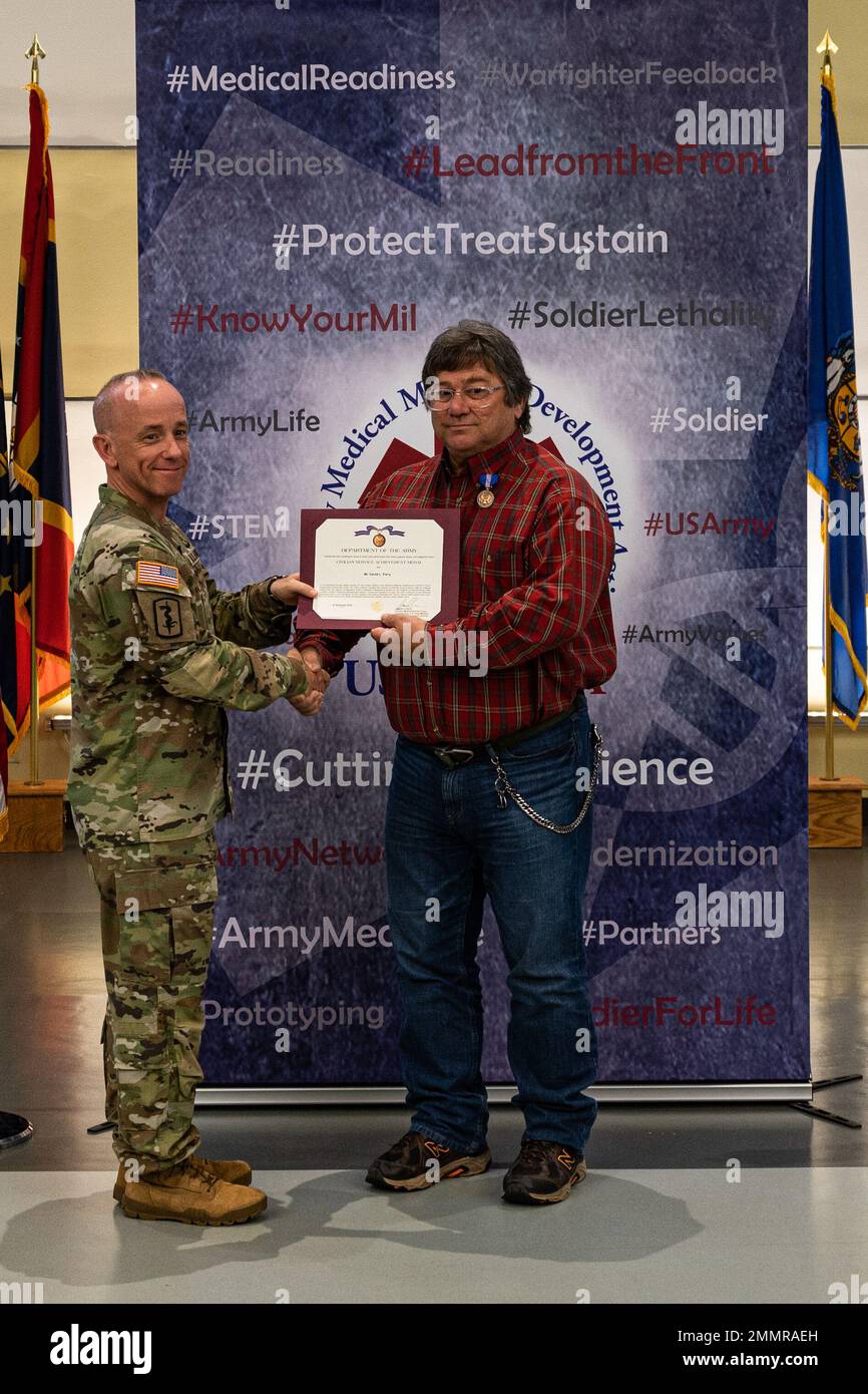 Col. Andy Nuce presents David Parry Department of the Army Civilian ...