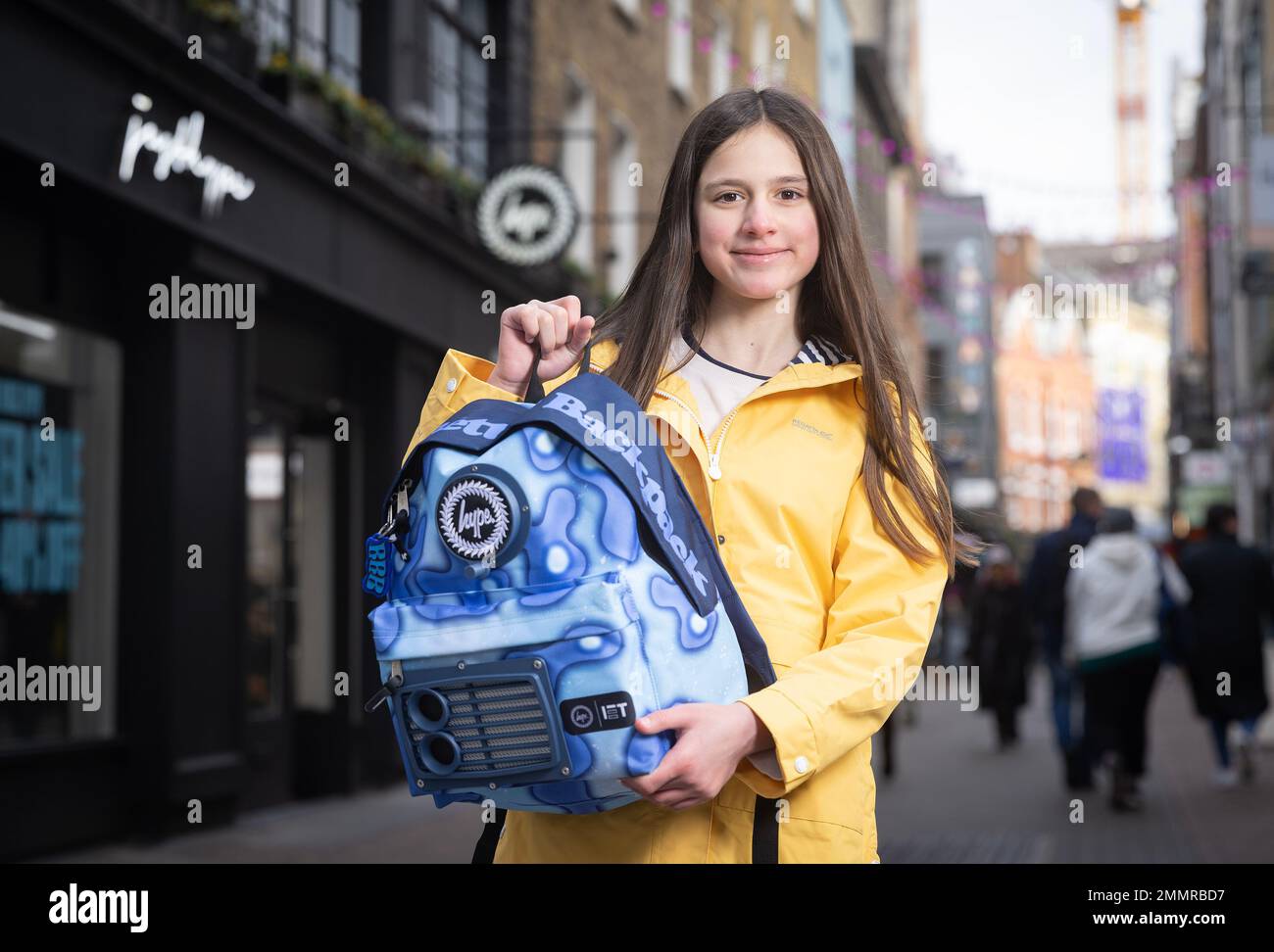 EDITORIAL USE ONLY Eleanor Wood, 12, models her winning design from the ...
