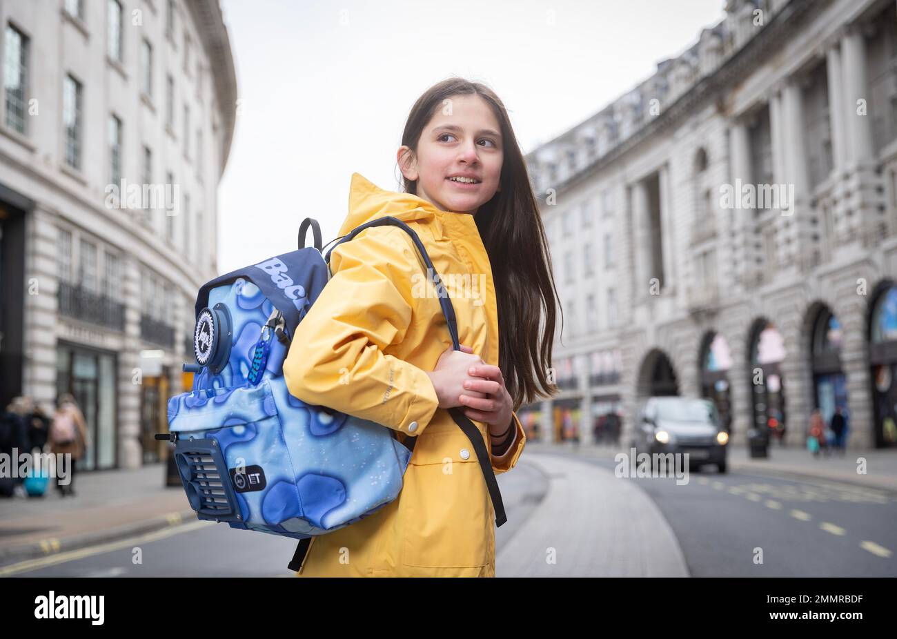 EDITORIAL USE ONLY Eleanor Wood, 12, models her winning design from the ...