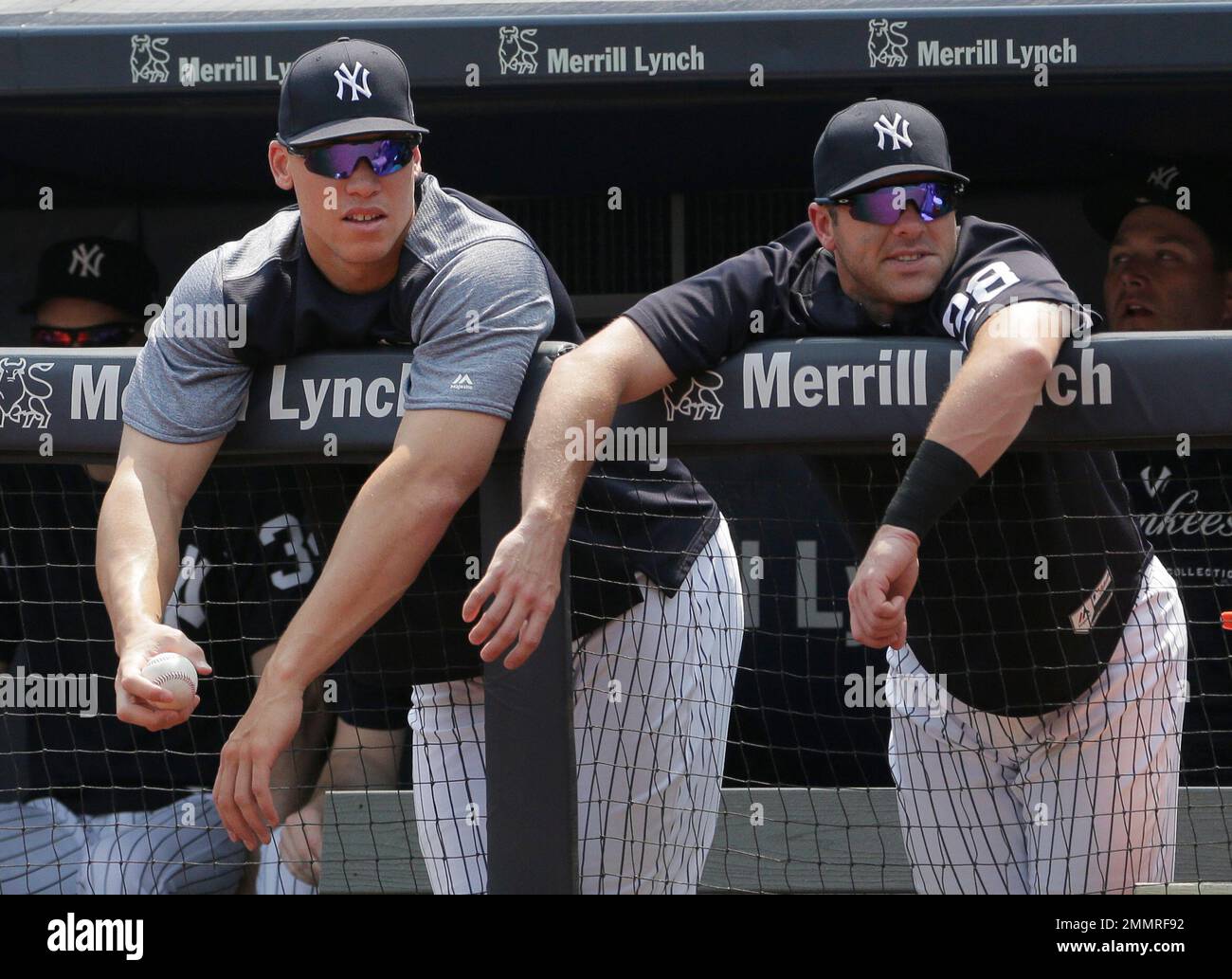 New York Yankees' Aaron Judge, left, and Austin Romine watch the game ...