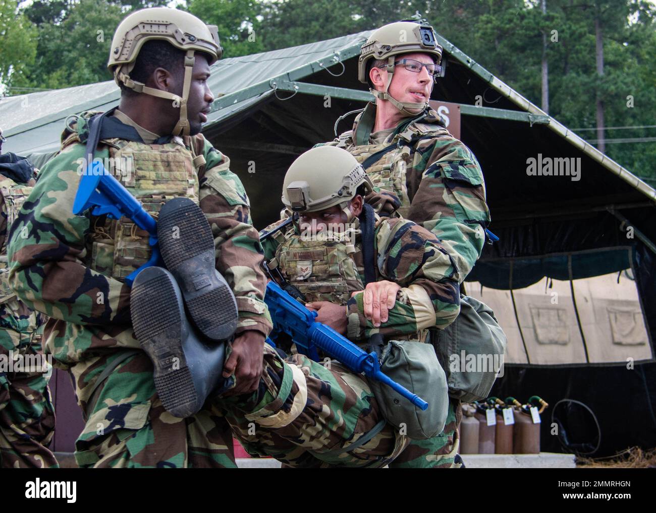 94th Security Forces Squadron Airmen carry a simulated wounded Airman ...