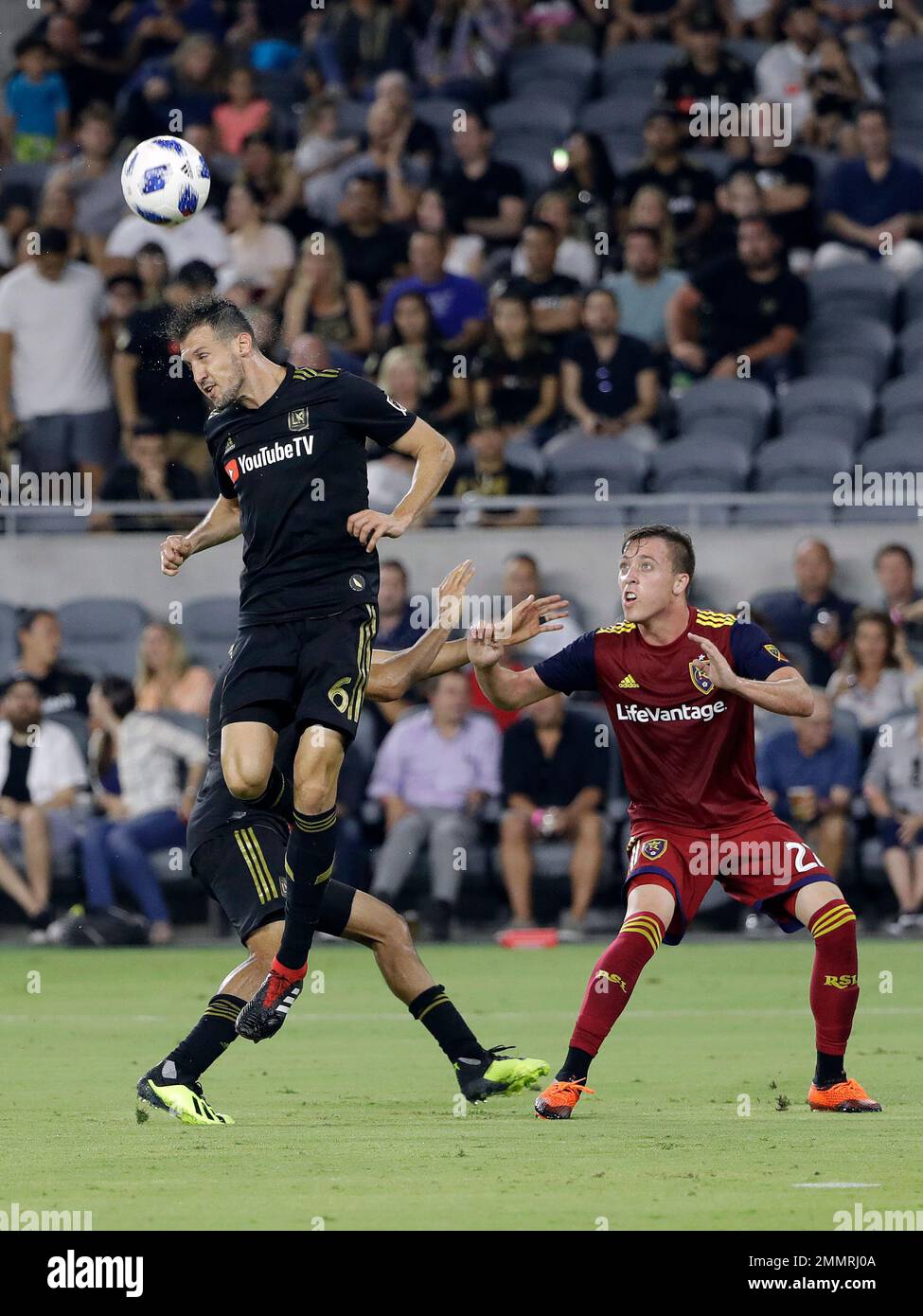 Los Angeles FC's Danilo Silva, left, heads the ball next to Real Salt ...