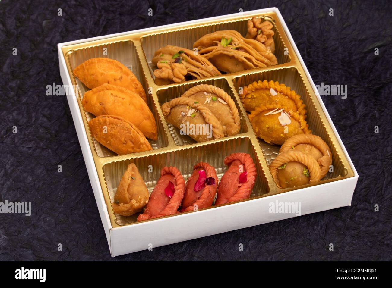 Variety Of Traditional Indian Mithai Gujiya Also Called Gujia, Ghughra ...