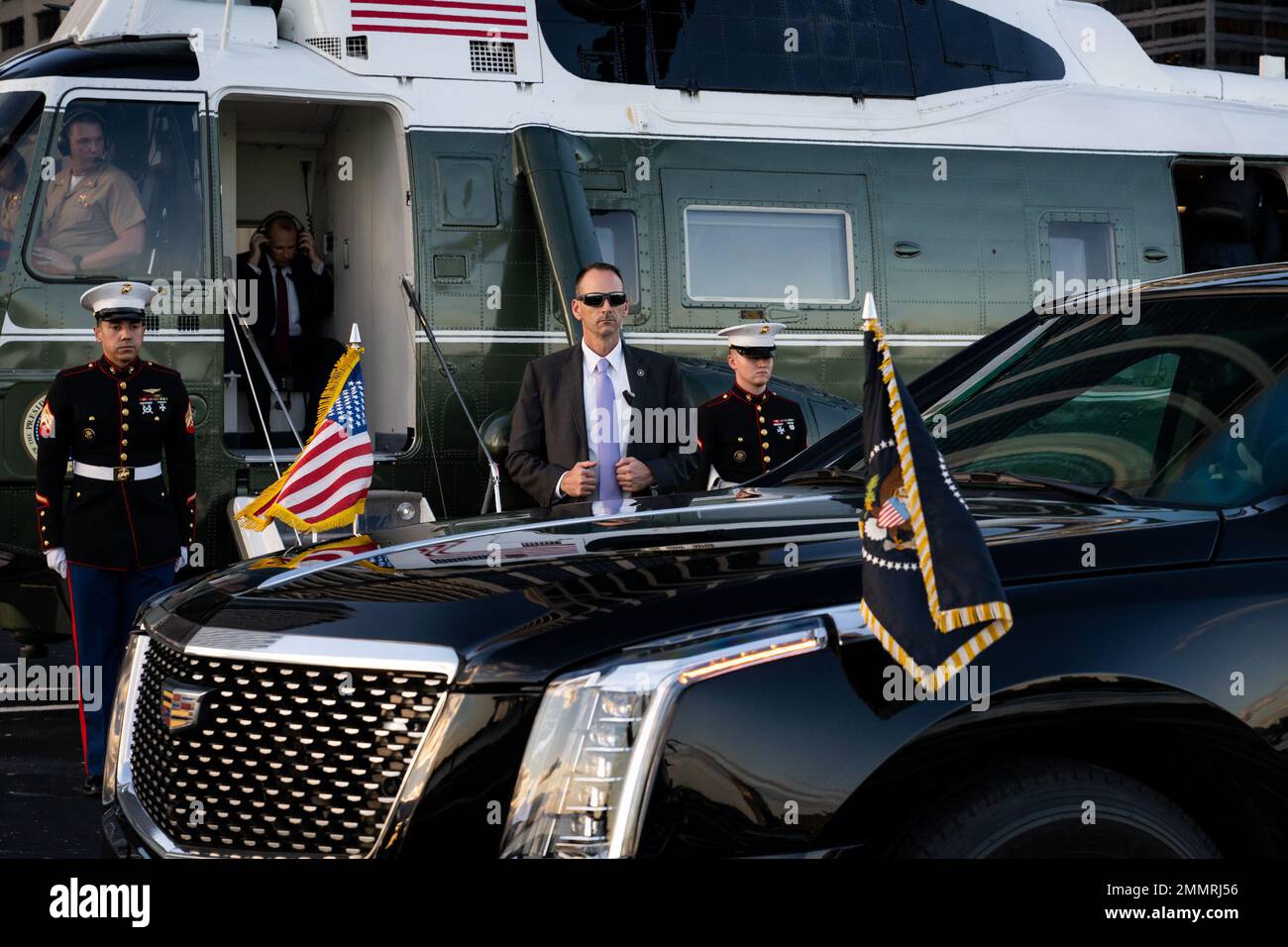 A U.S. Secret Service Agent provides security as the President of the ...