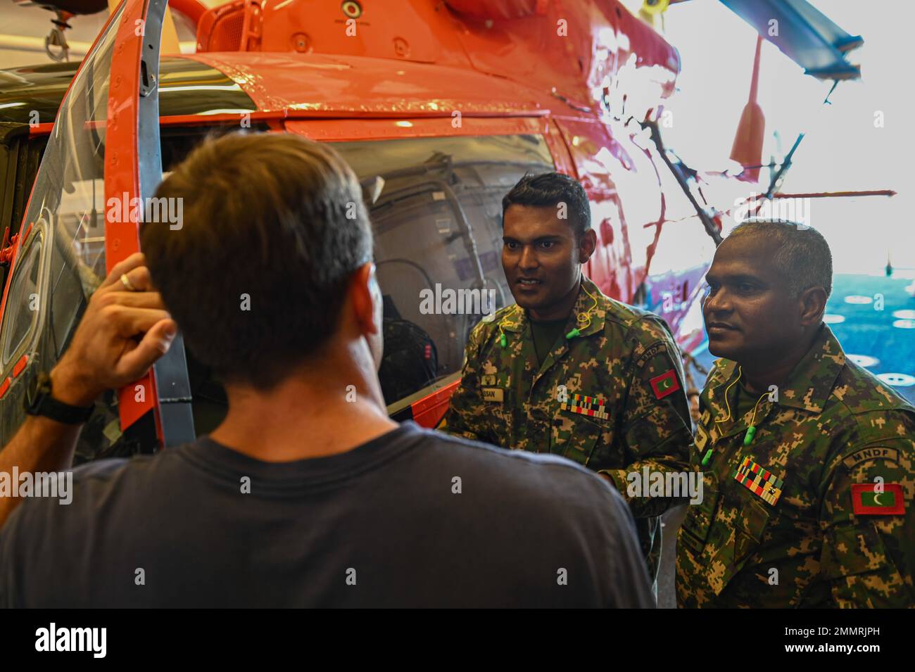 Lt. Cmdr. Jack Sauve explains some of the characteristics of the MH-65E ...