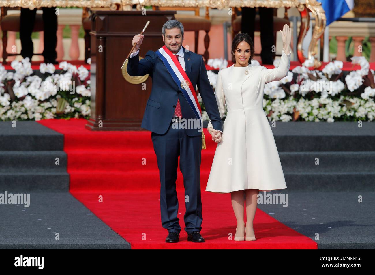 Paraguay's new President Mario Abdo Benitez, flanked by his wife ...