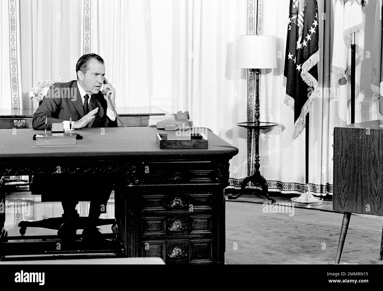President Richard M Nixon Uses His White House Desk Telephone After