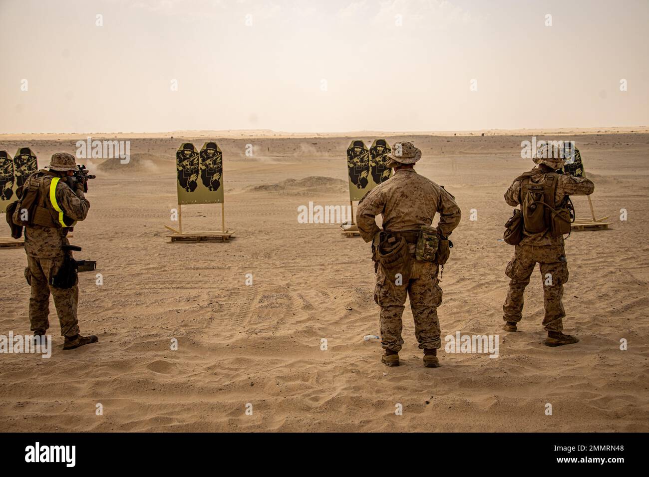 U.S. Marines with India Company, 3rd Battalion, 5th Marine Regiment, 1st Marine Division engage ...