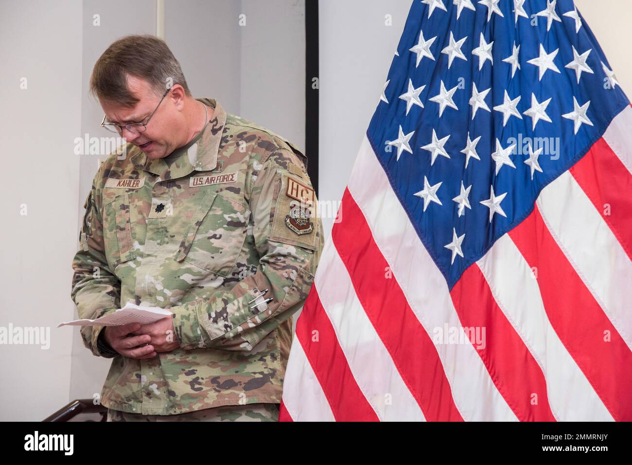 Chaplain David Kahler provides the invocation during a change of ...