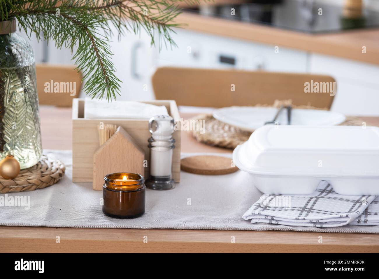 Food delivery service containers on table in white kitchen, festively ...