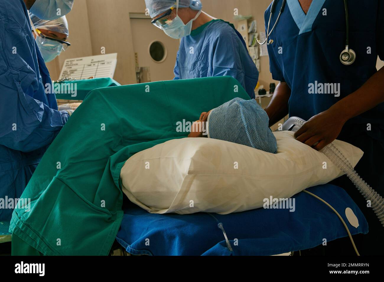 Saving lives is what they do best. a team of surgeons performing a ...
