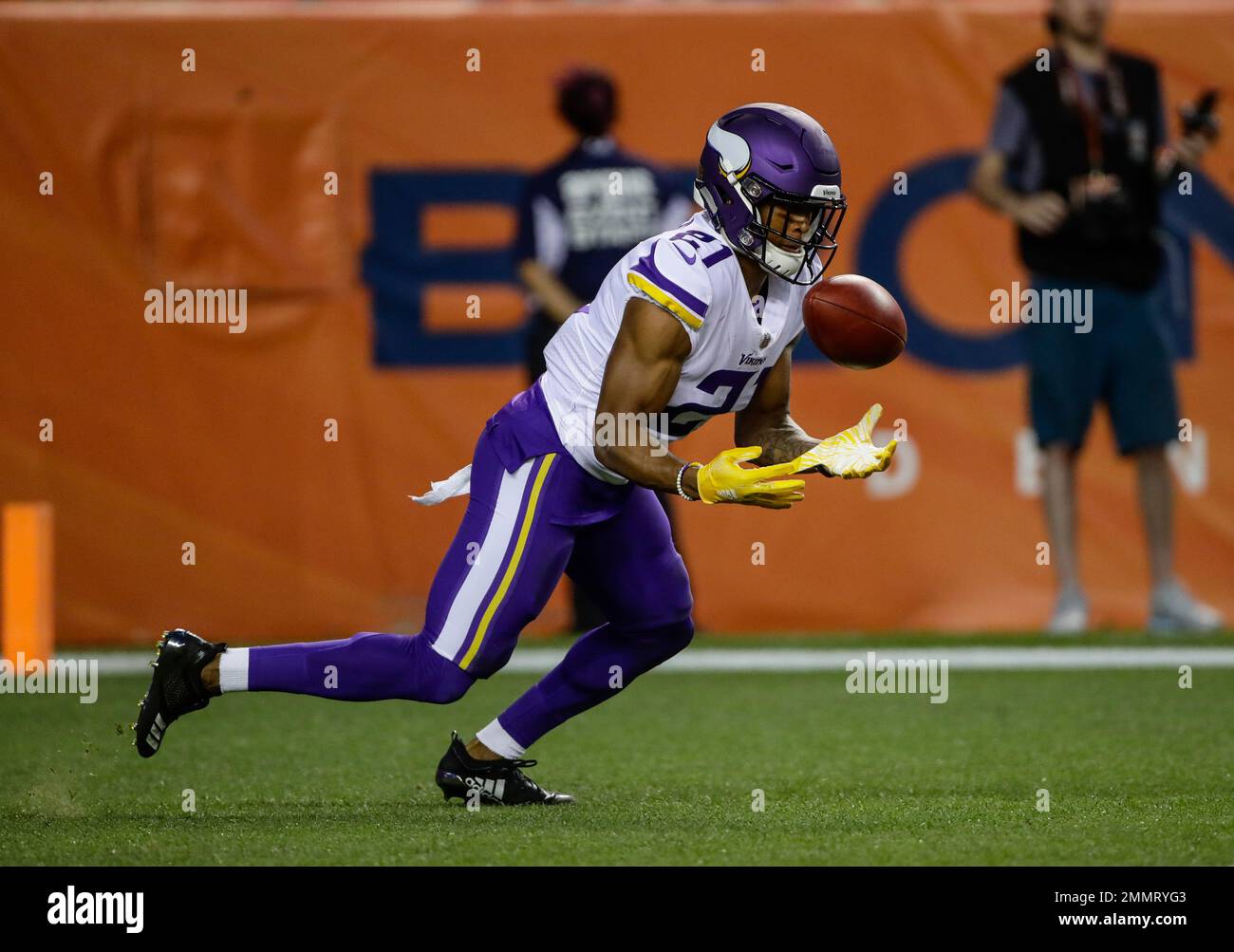 Minnesota Vikings cornerback Mike Hughes (21) bobbles a punt return ...