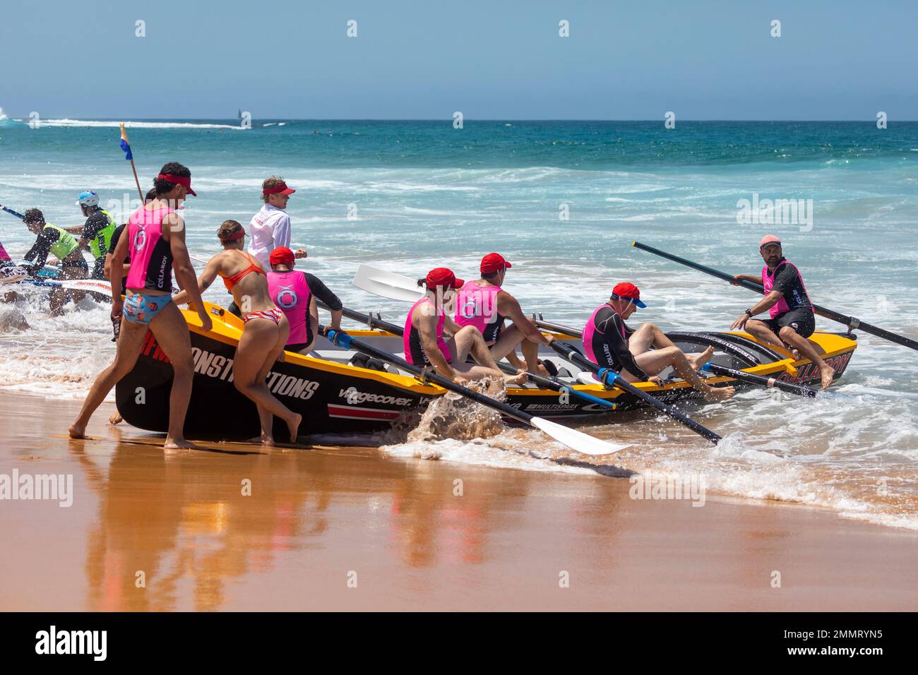 Sydney surfboat racing carnival at North Narrabeen beach, local surf ...