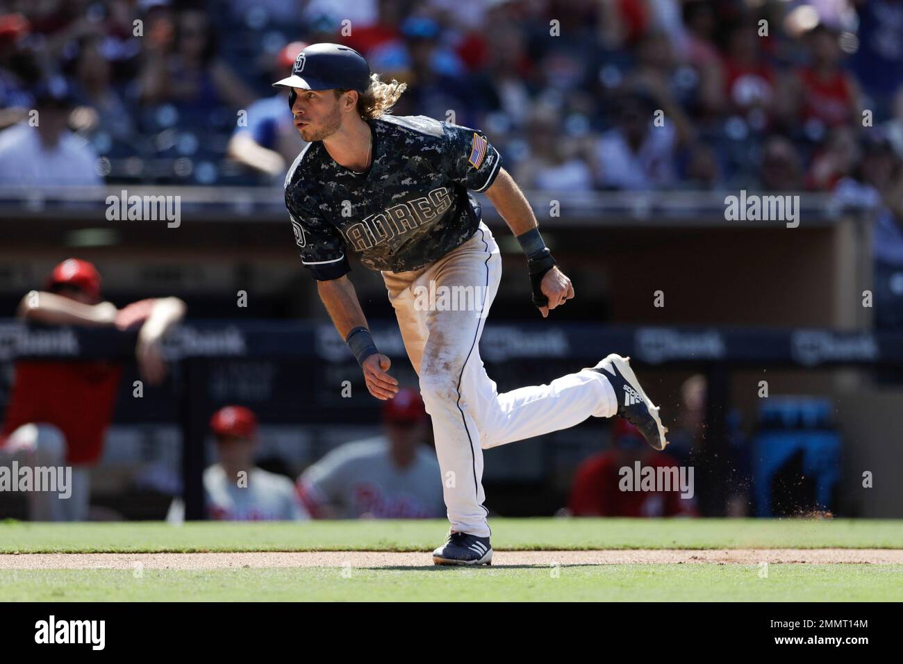 The San Diego Padres' Travis Jankowski gets ready to run after stealing ...