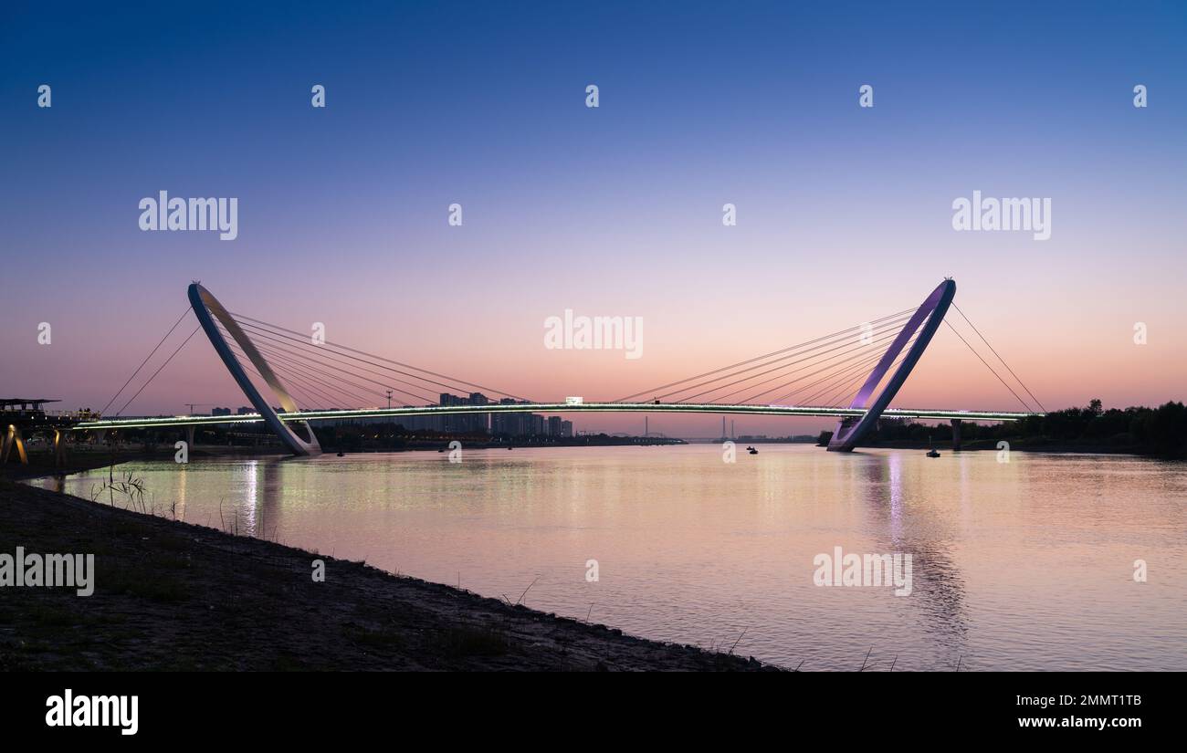 Eye of nanjing pedestrian bridge at night Stock Photo - Alamy