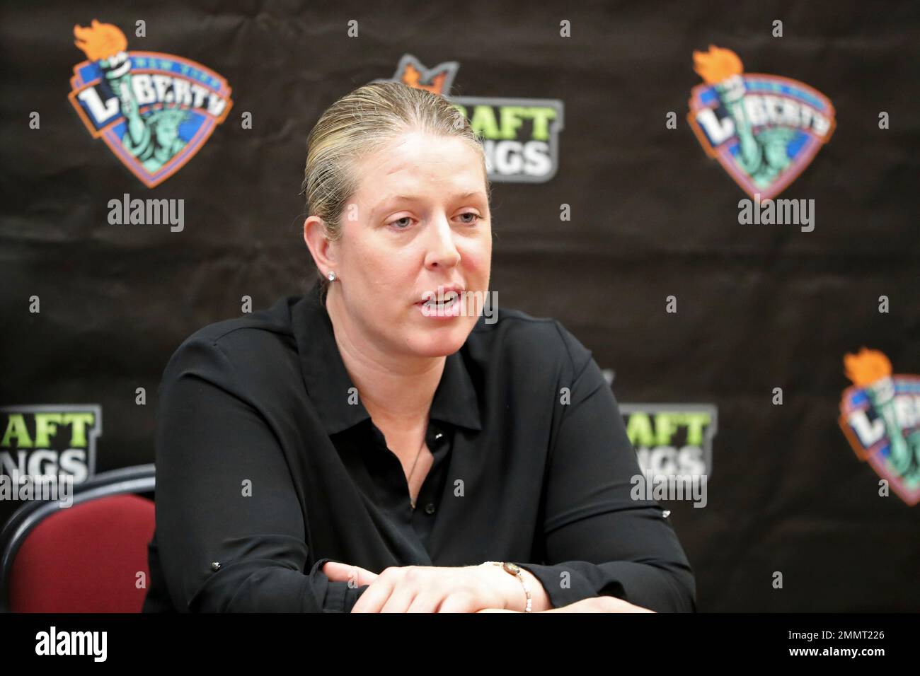 New York Liberty head coach Katie Smith participates in a post game ...