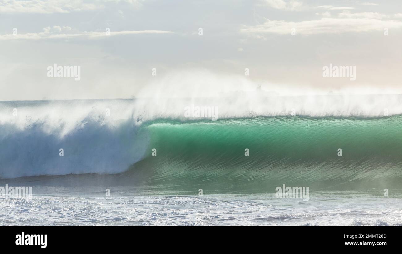 Ocean wave large tropical emerald color water wall crashing breaking ...