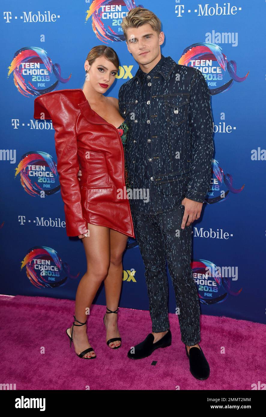 Lele Pons, left, and Twan Kuyper arrive at the Teen Choice Awards at ...
