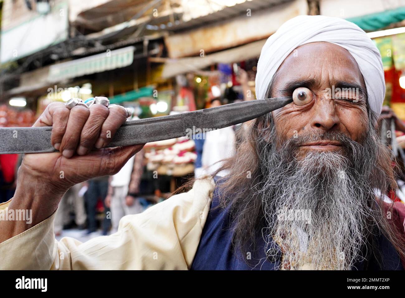 Graphic Content - Muslim Sufi devotee use sharp objects to self ...