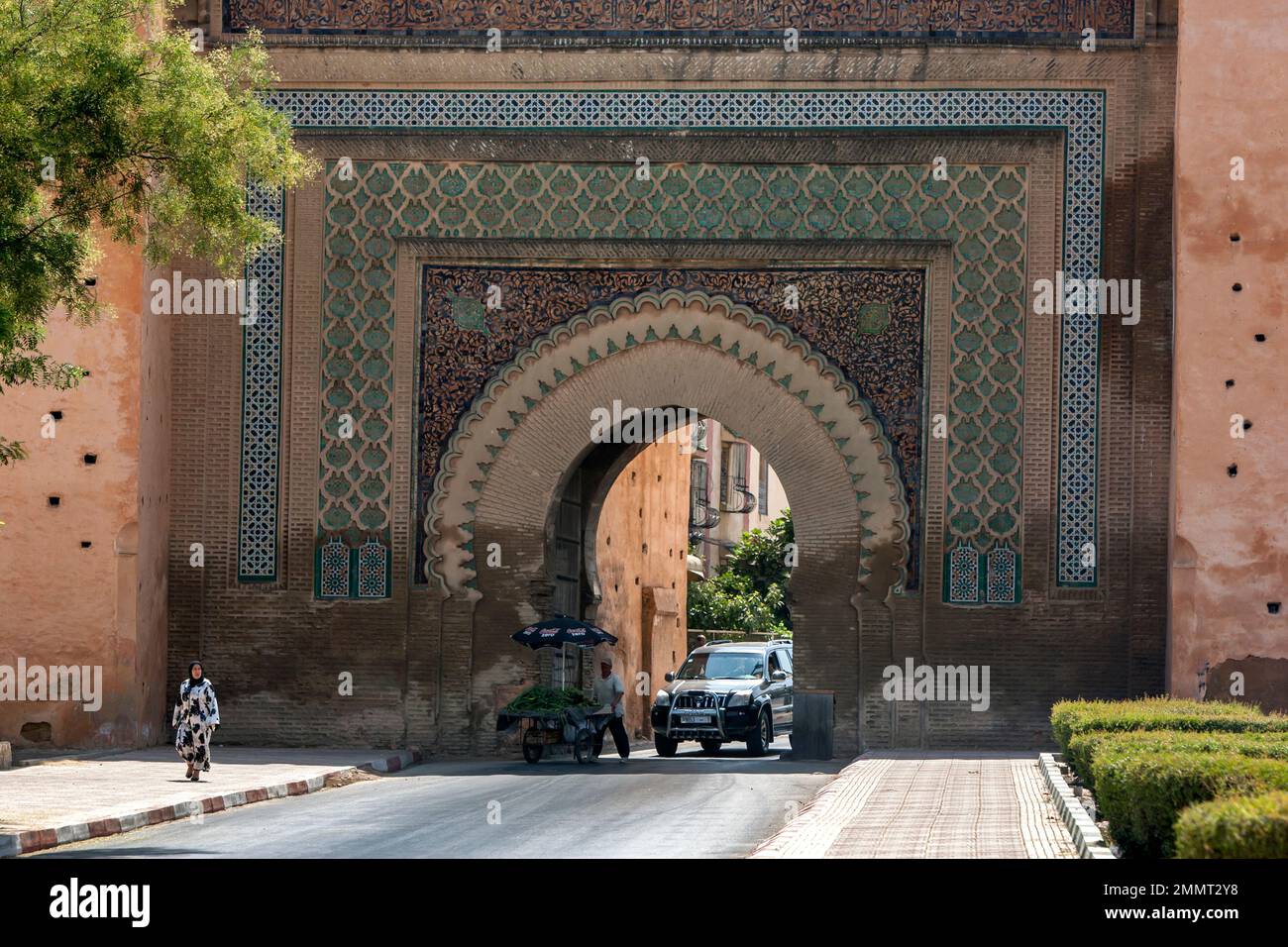 Traffic moves through the Bab El-Khemis Gate at Meknes in Morocco. The ...