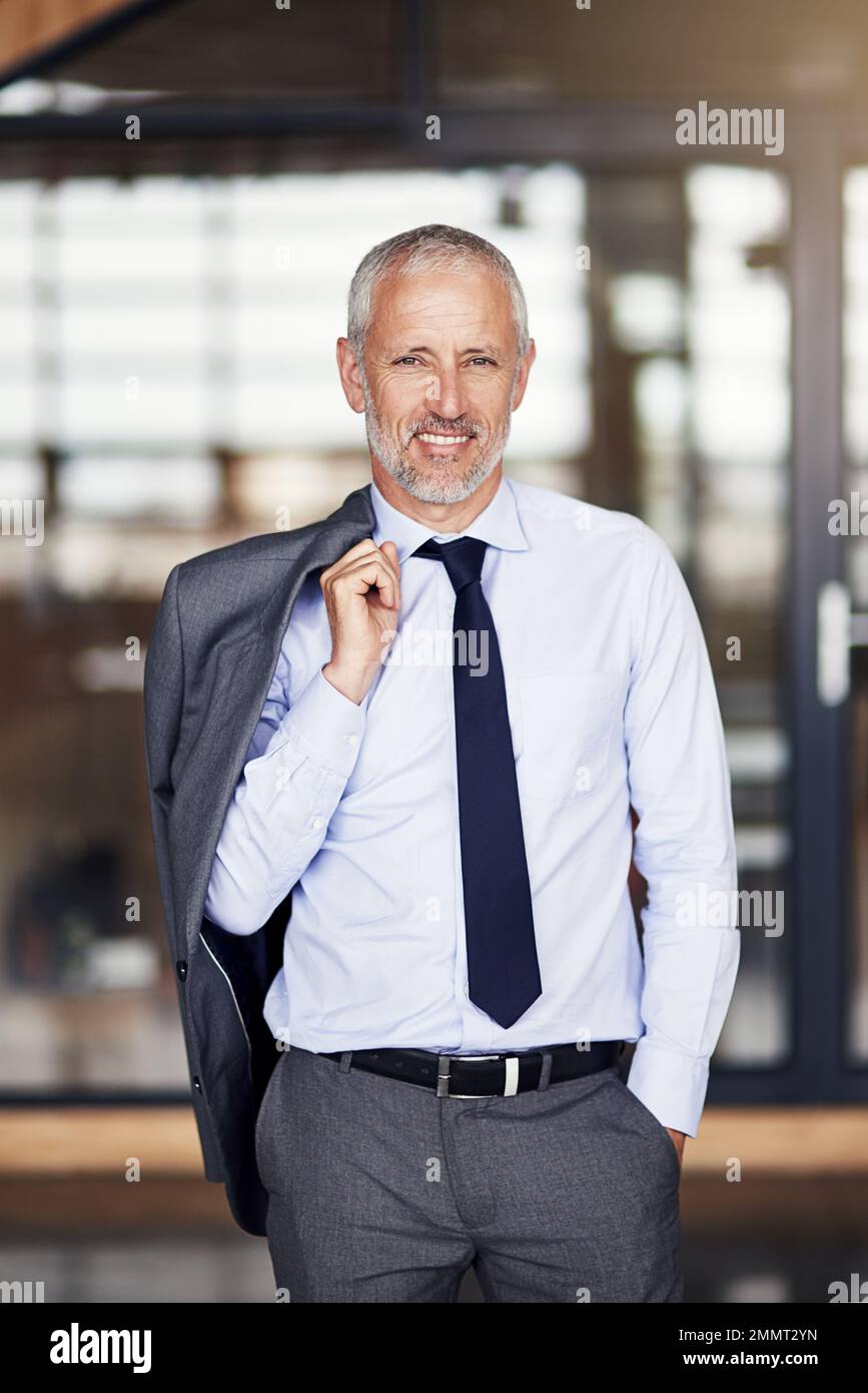 Hes a well respected businessman. Cropped portrait of a mature ...