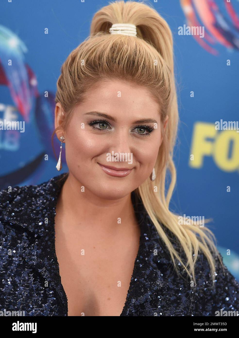 Meghan Trainor arrives at the Teen Choice Awards at The Forum on Sunday ...