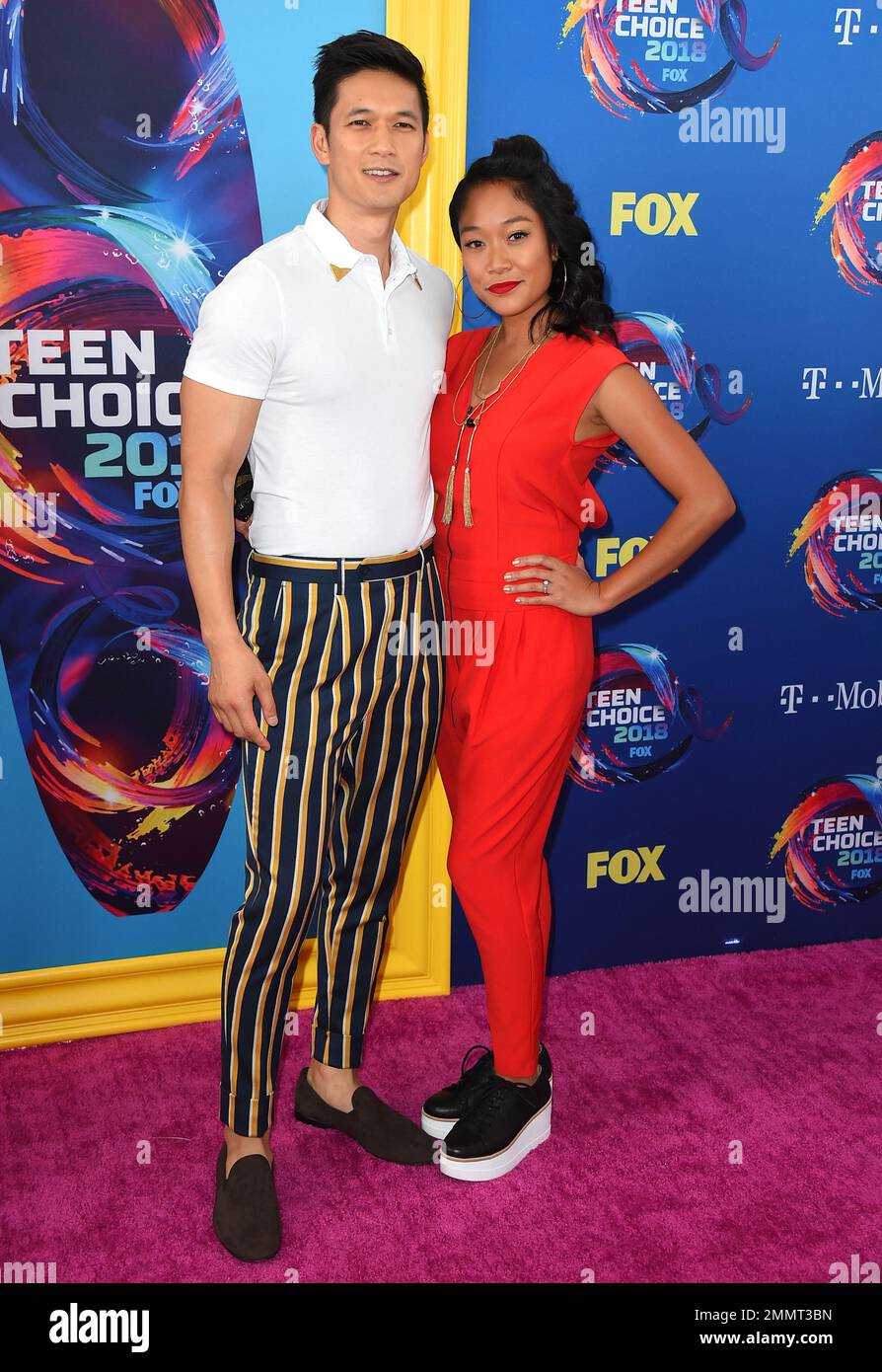 Harry Shum Jr., left, and Shelby Rabara arrive at the Teen Choice ...