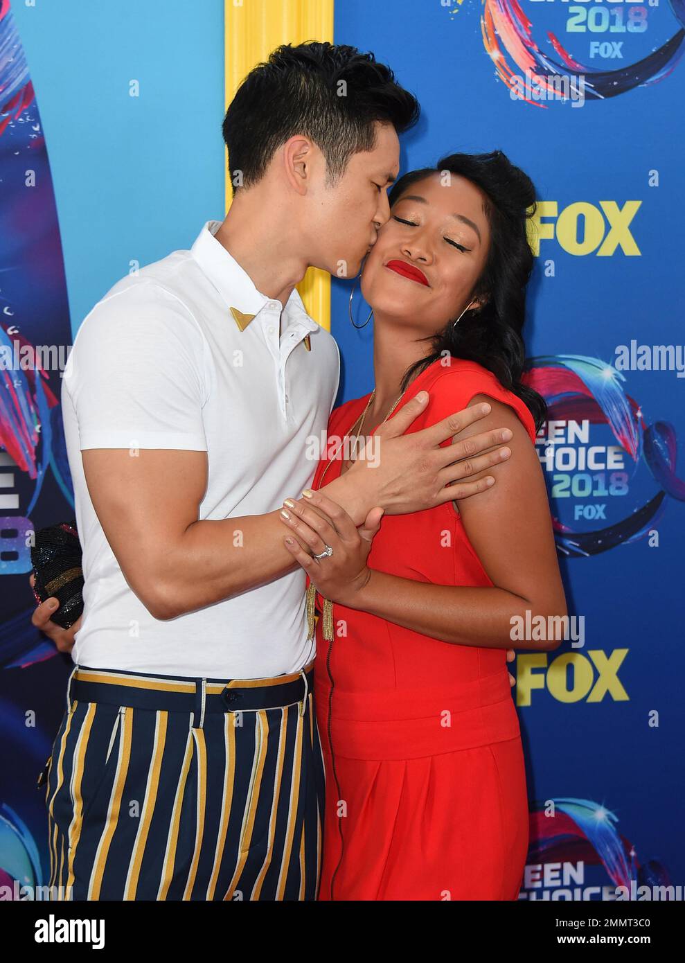 Harry Shum Jr., left, and Shelby Rabara arrive at the Teen Choice ...