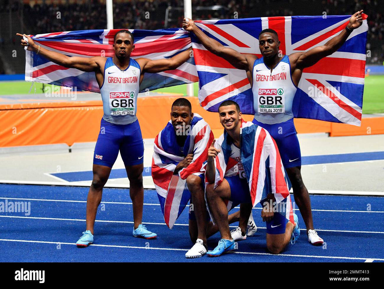 The British team celebrate after winning the gold medal in the men's ...