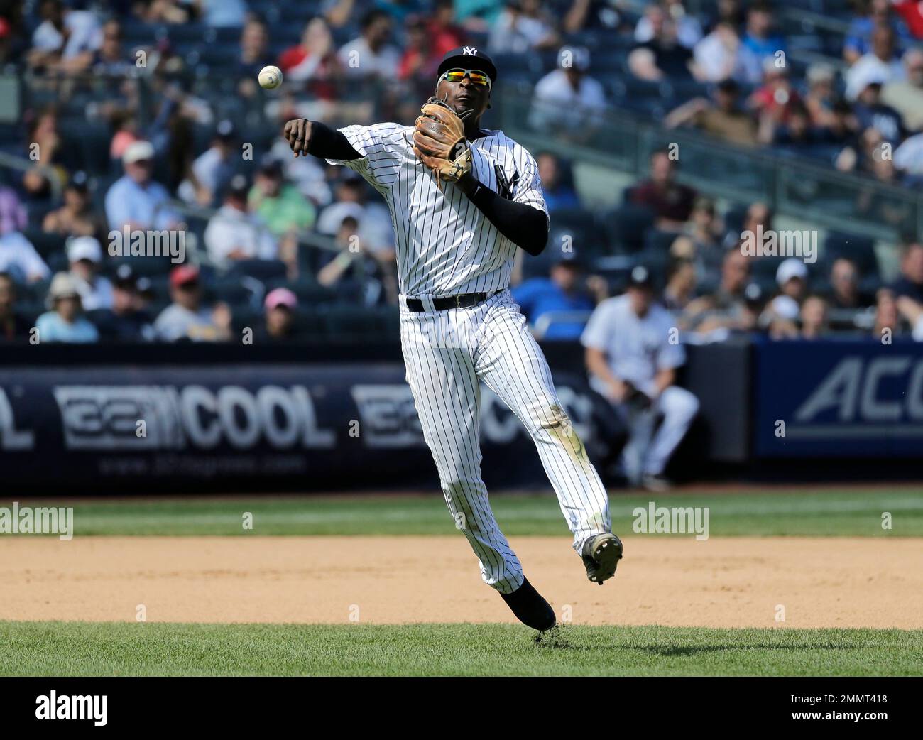 New York Yankees shortstop Didi Gregorius makes a throw to first base ...