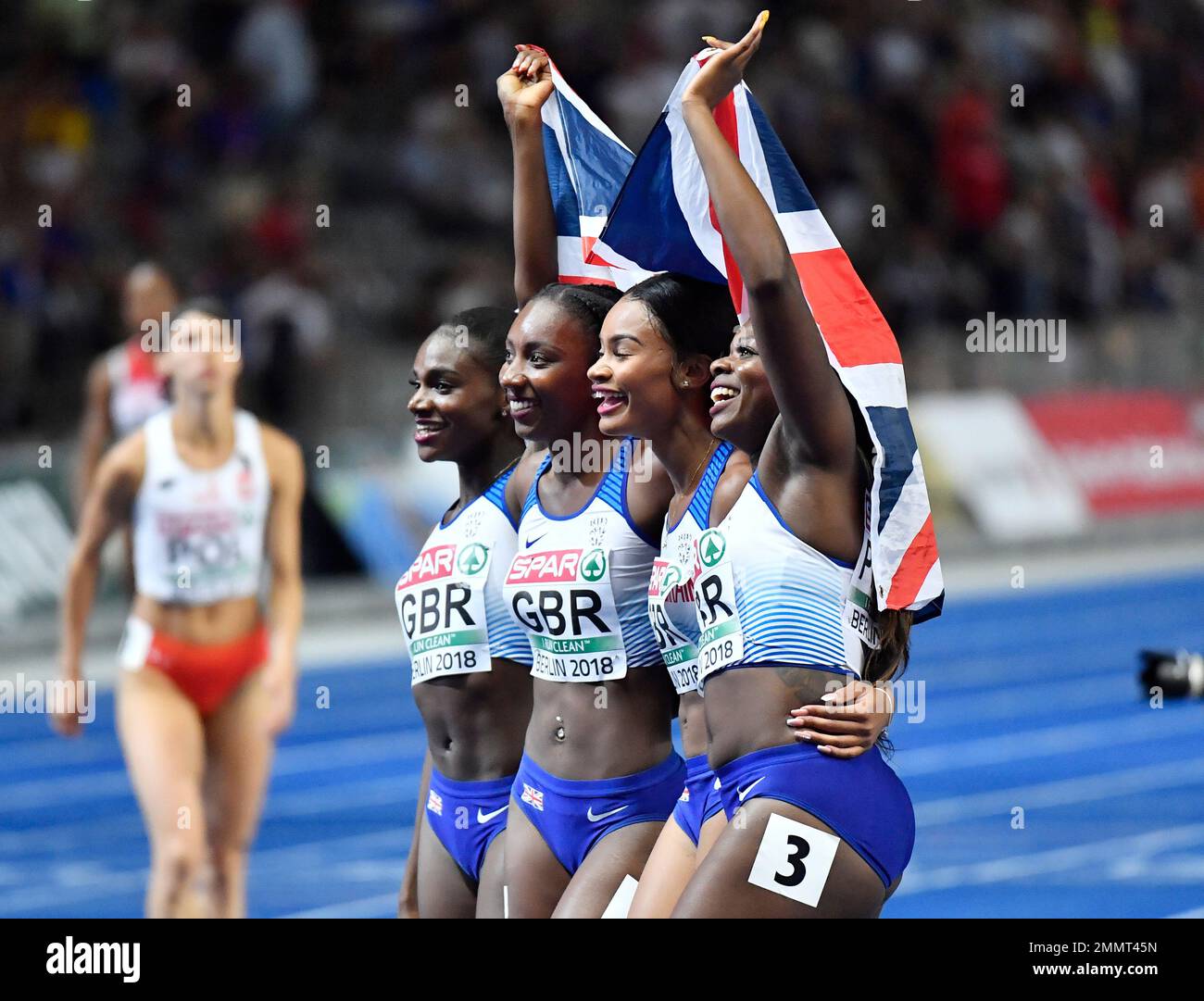 The British relay team celebrate winning the gold medal in the women's ...