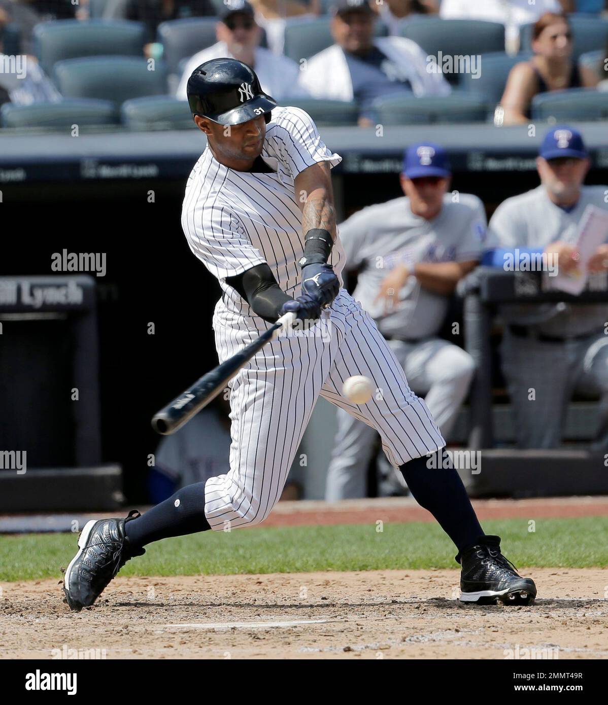 New York Yankees' Aaron Hicks hits a two-run single during the fifth ...