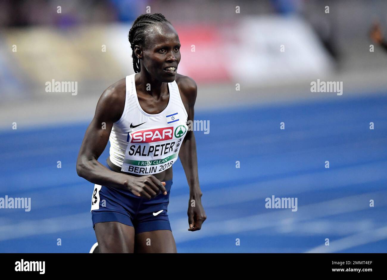 Israel's Lonah Chemtai Salpeter continues the race after after stopping ...