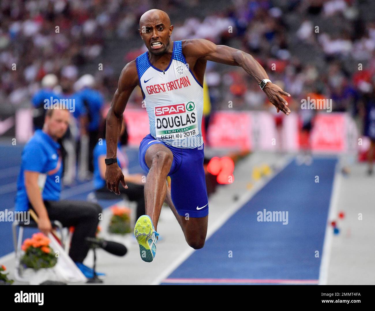 Britain's Nathan Douglas makes an attempt in the men's triple jump ...