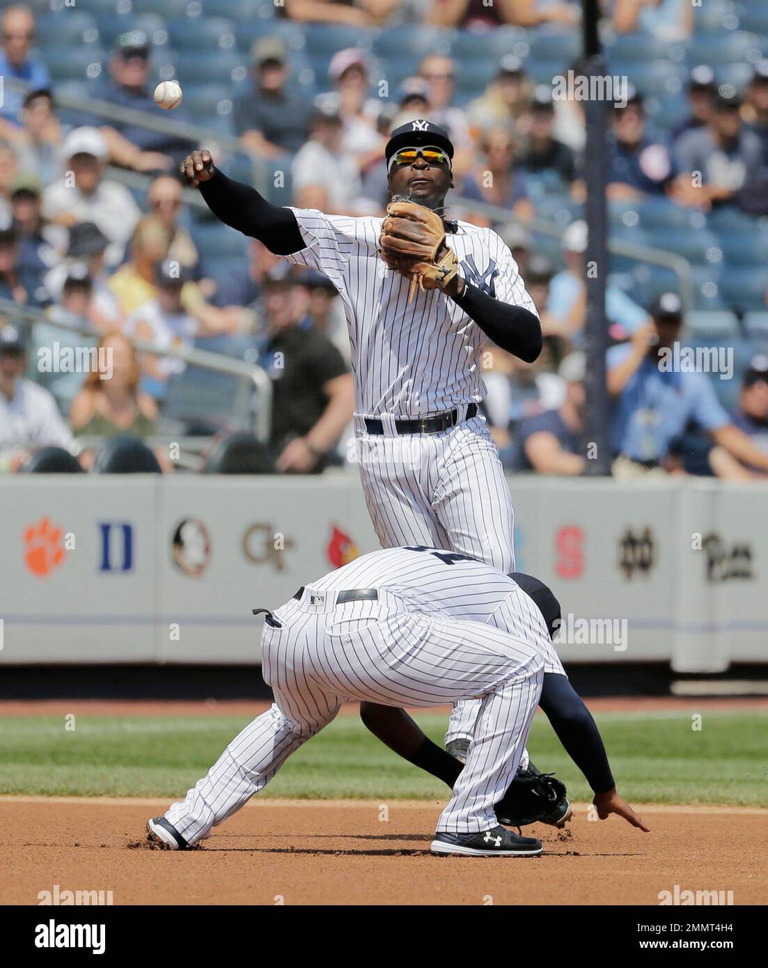 New York Yankees shortstop Didi Gregorius throws out a runner over ...