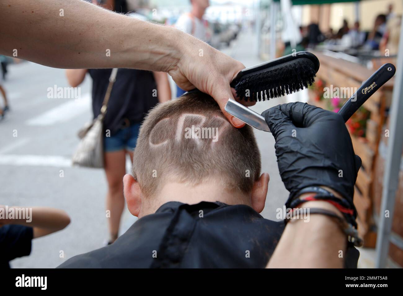 A man has CR7, standing for Cristiano Ronaldo's initials and his soccer ...