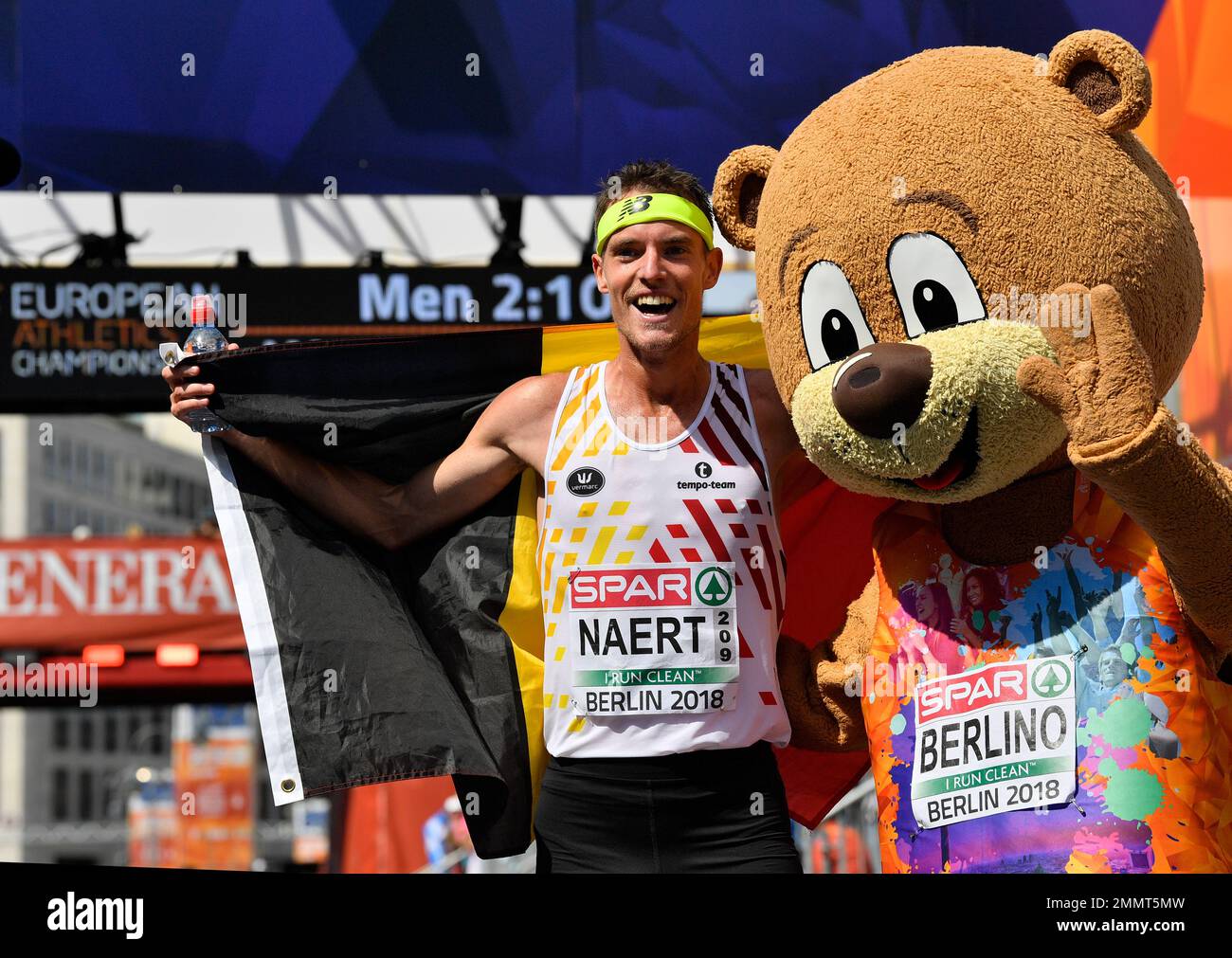 Belgium's Koen Naert celebrates with mascot Berlino after winning the ...