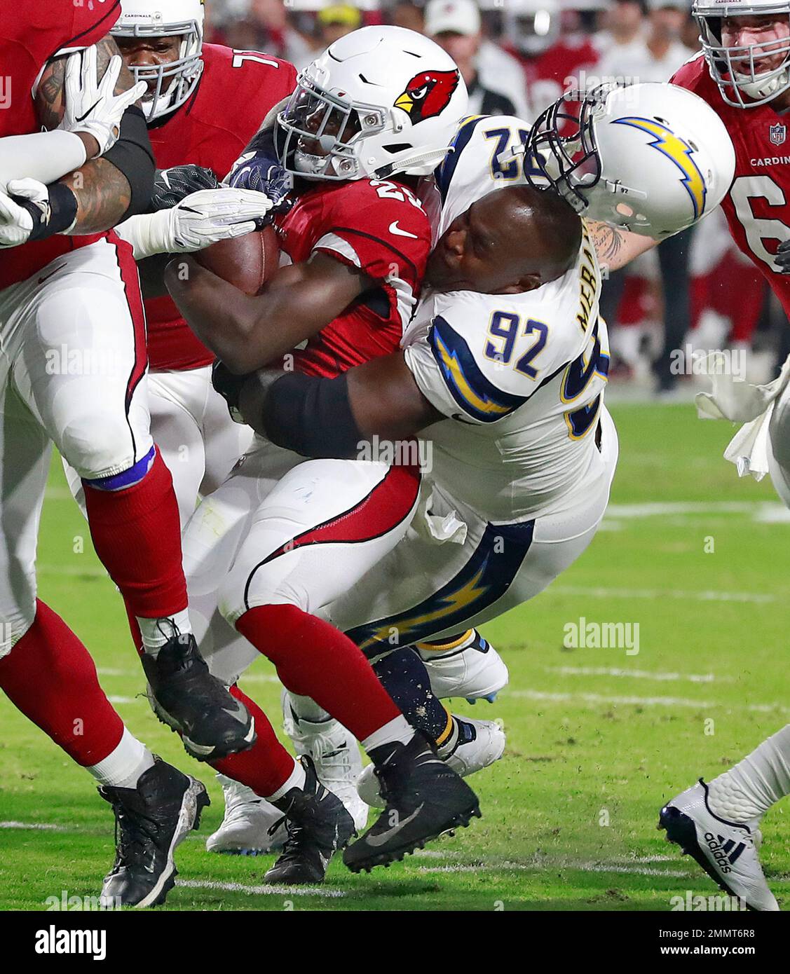 Los Angeles Chargers defensive tackle Brandon Mebane (92) loses his ...