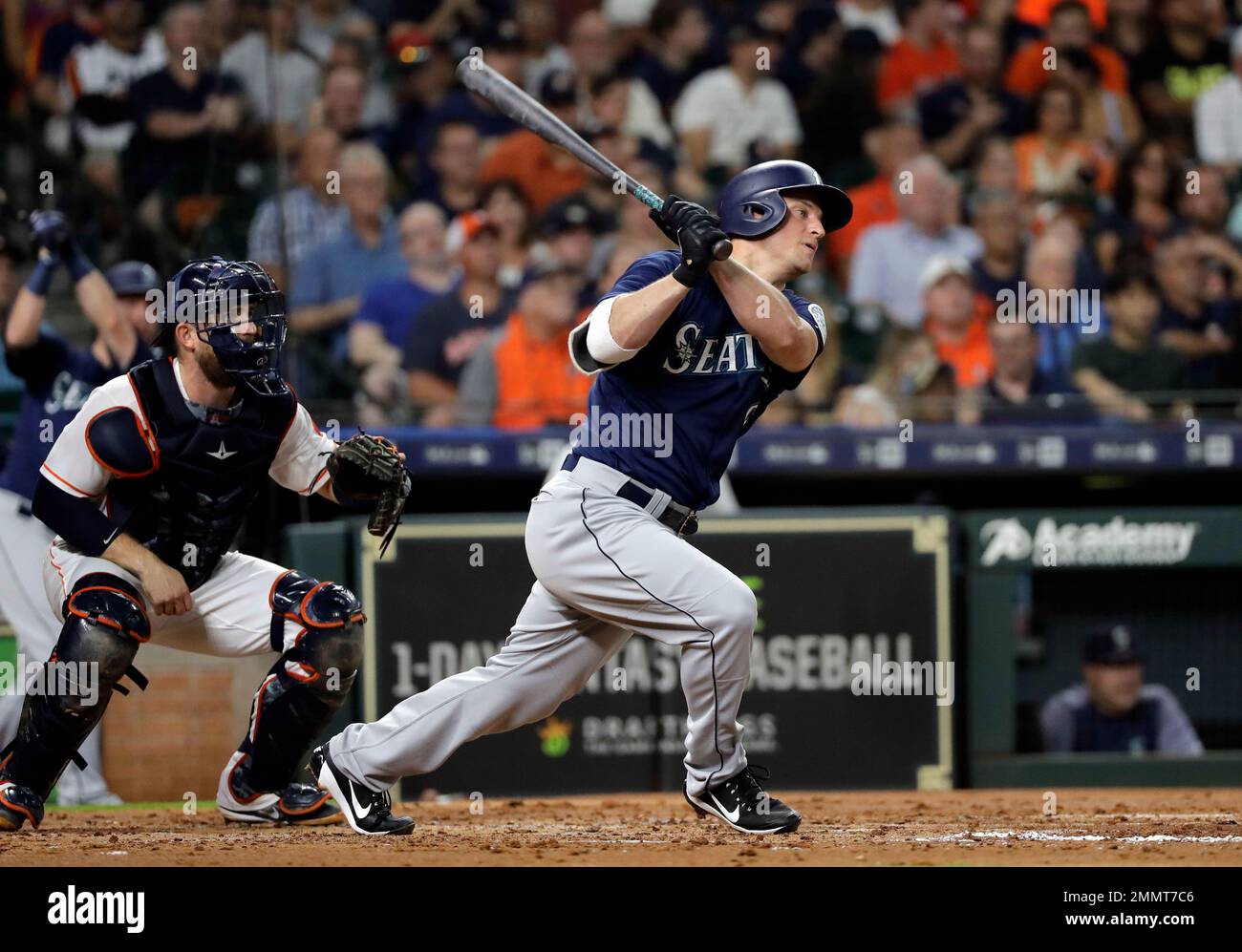 Seattle Mariners' Kyle Seager, right, hits an RBI-double as Houston ...
