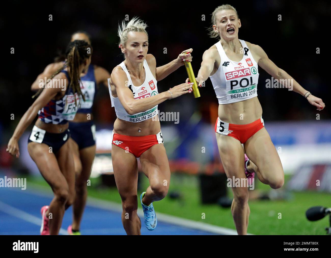 Poland's Justyna Swiety-Ersetic, front, competes during the women's 4 x ...