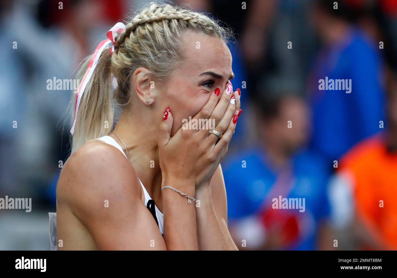 Poland's Justyna Swiety-Ersetic celebrates after winning the gold medal ...