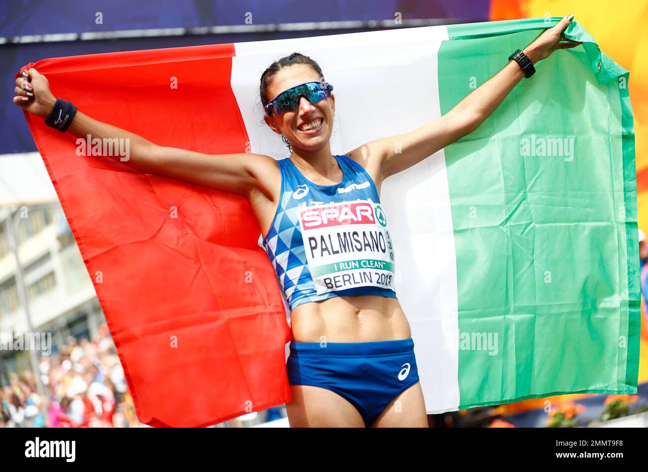 Third placed Antonella Palmisano from Italy celebrates her bronze medal ...